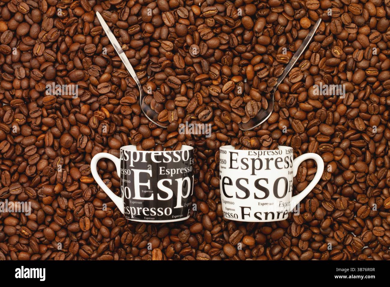 Two Cups of coffee on a table full of coffee beans. Coffee design Stock ...