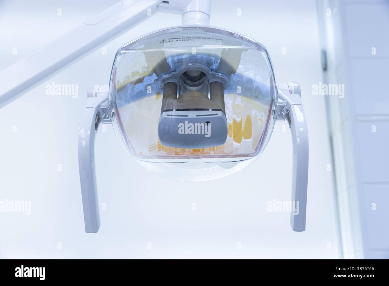 An advanced dental examination light is showcased in this image ...