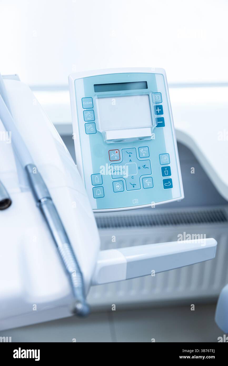 Modern dental equipment showcasing a dental chair control panel ...