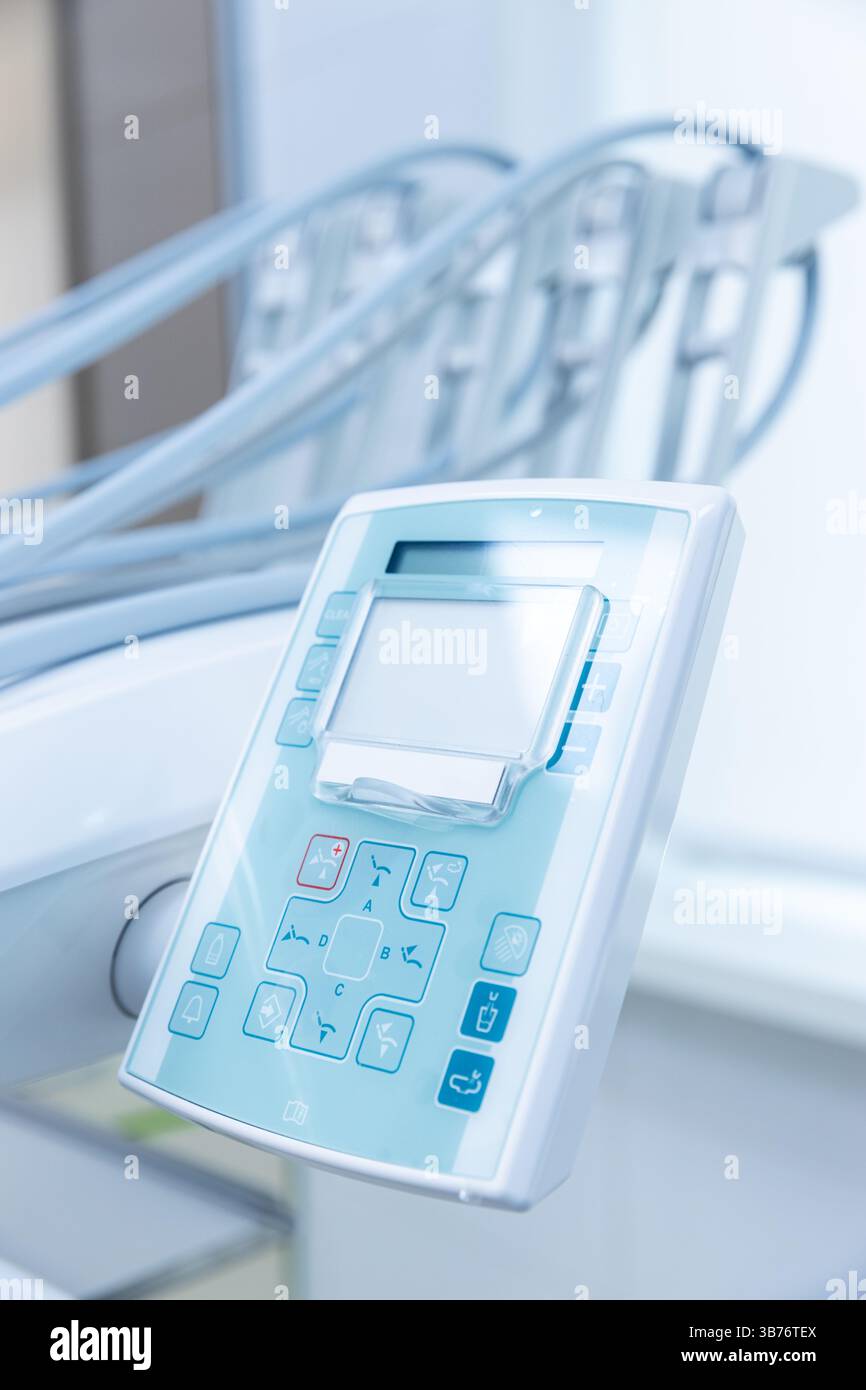 Modern Dental Equipment: A Close-Up of a Dental Chair Control Panel Featuring Various Functions ...