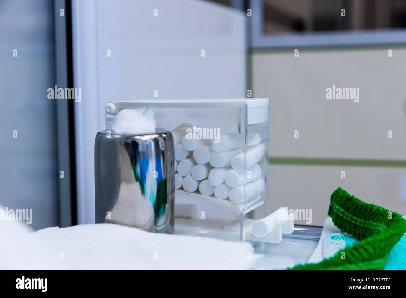 An Organized Medical Setup Featuring Cotton Balls and Essential ...