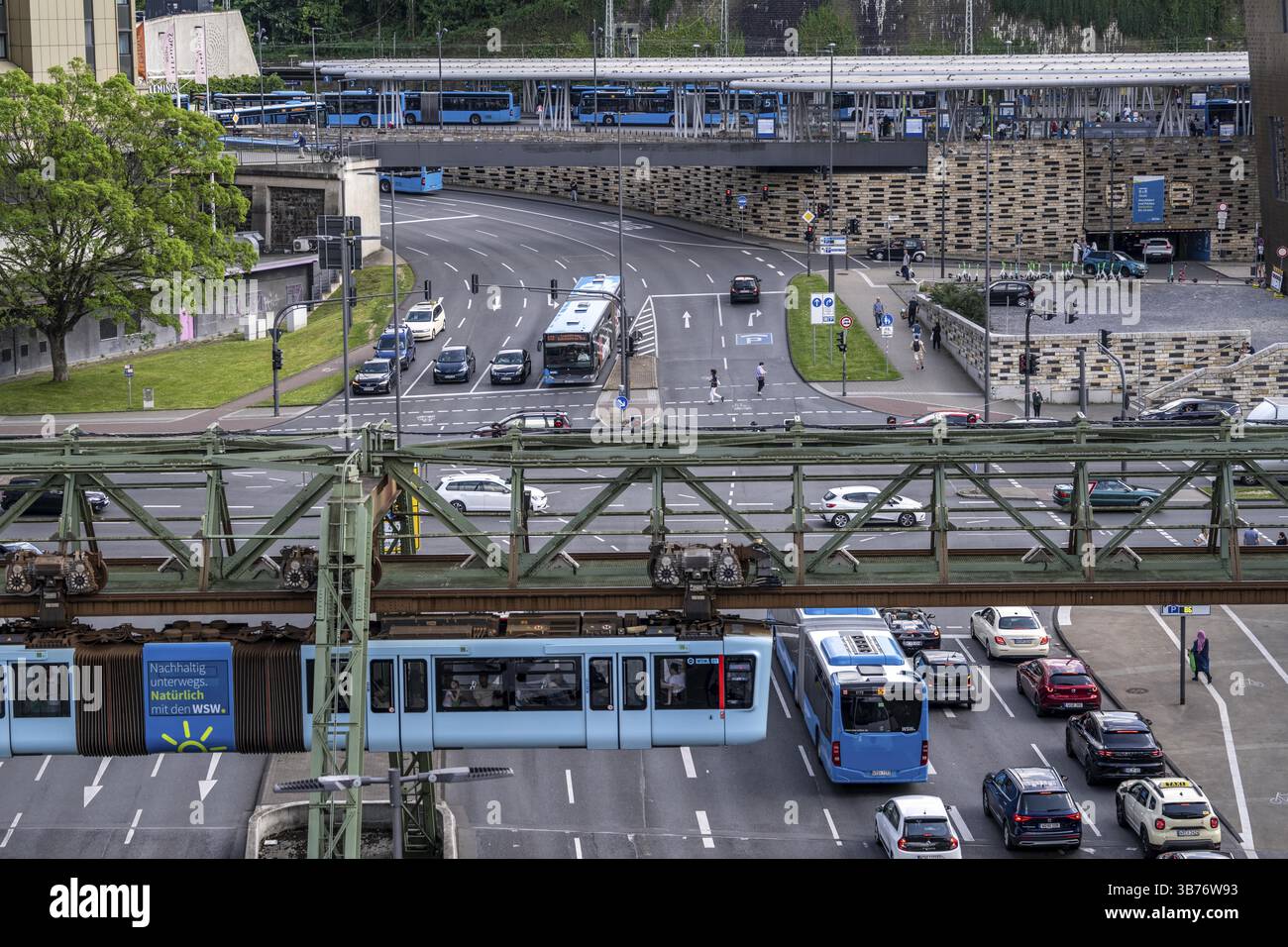Train of the Wuppertal suspension railway, local buses of the ...