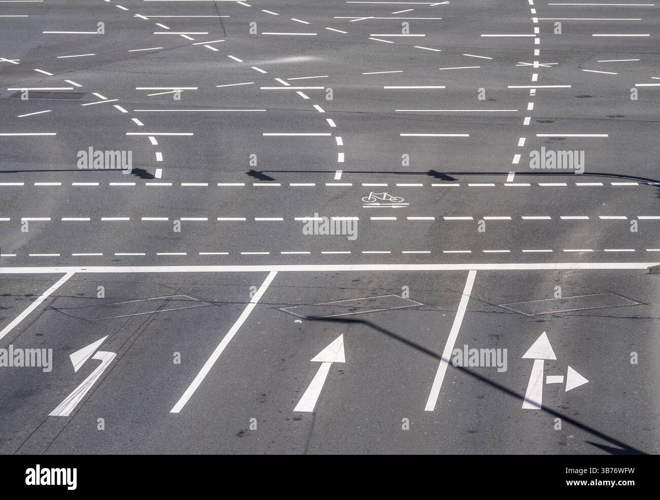 Markings at a multi-lane road junction, lanes for turners, pedestrians ...