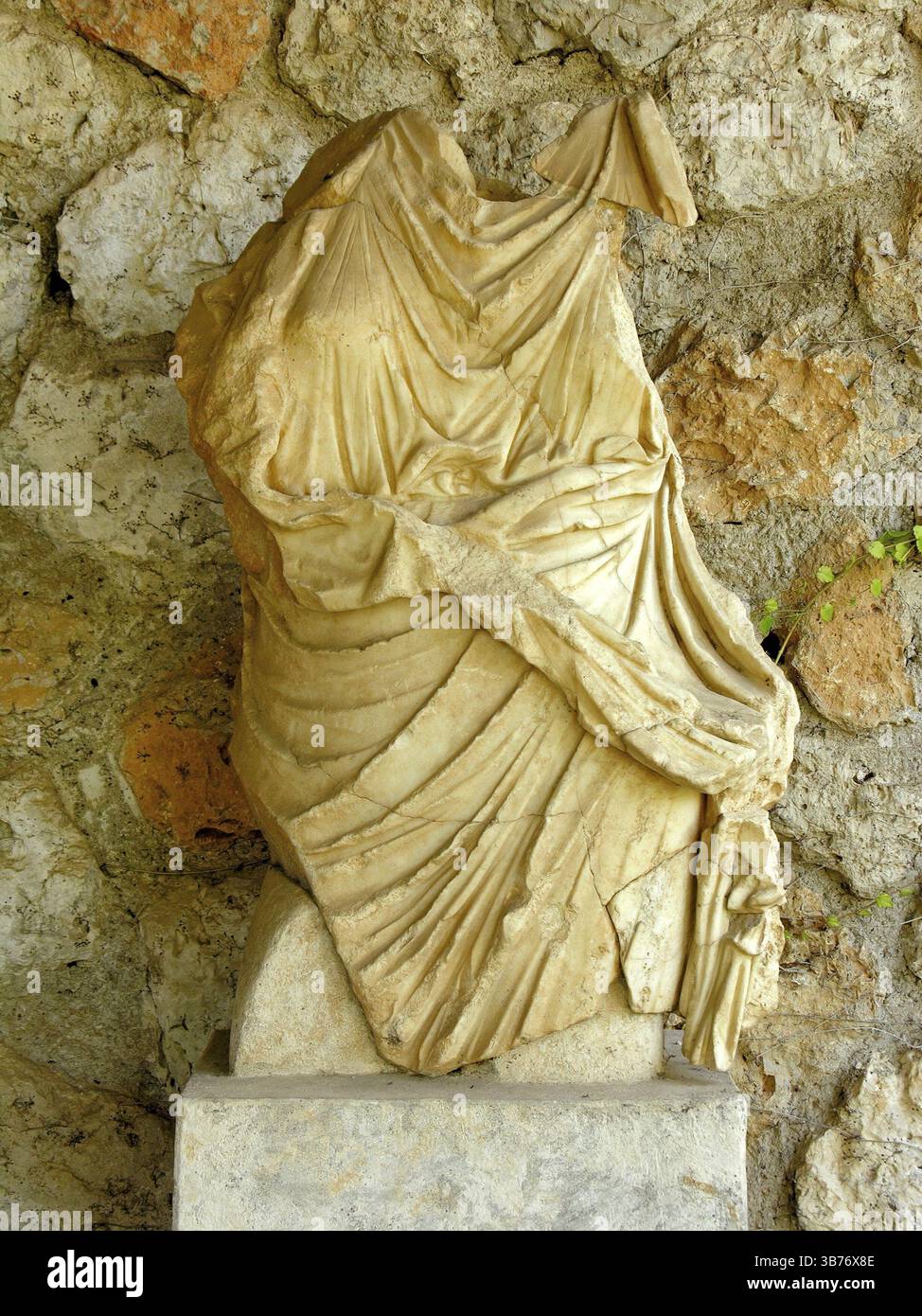 Ancient marble statue, fragment, Roman colony of Cosa, former city of ...