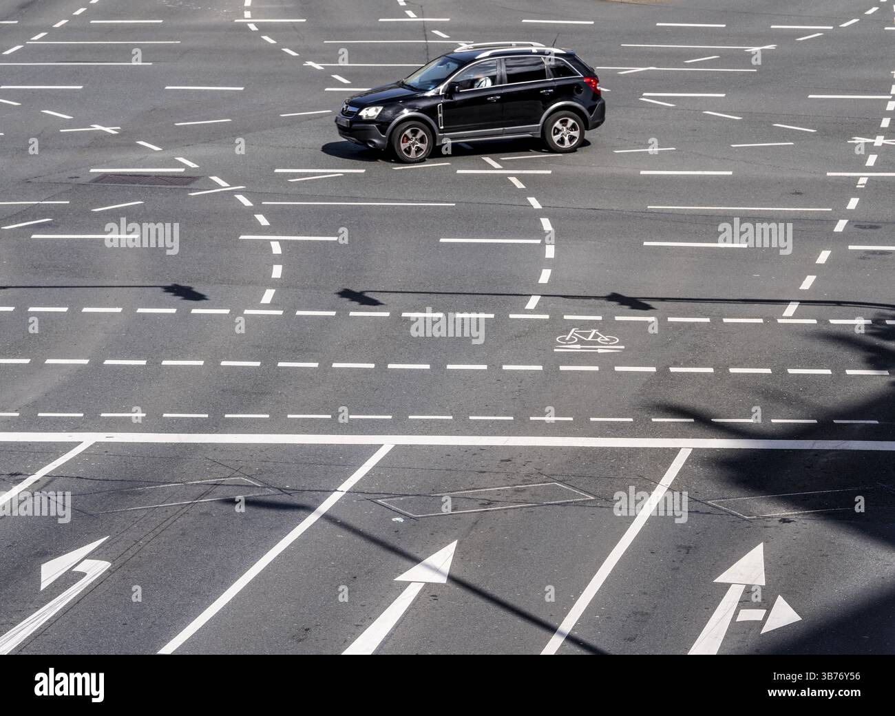 Markings at a multi-lane road junction, lanes for turners, pedestrians ...