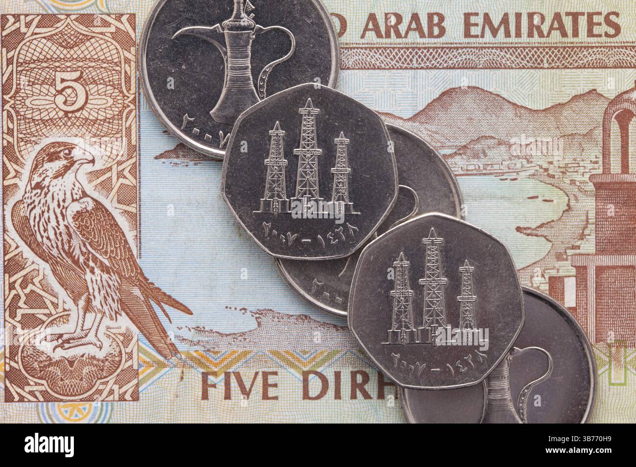 Different banknotes and coins of Arab Emirates Dirham Stock Photo - Alamy