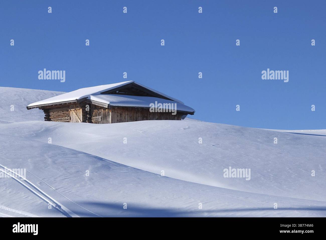 Wooden challet in the Dolomites mountain in winter Stock Photo - Alamy