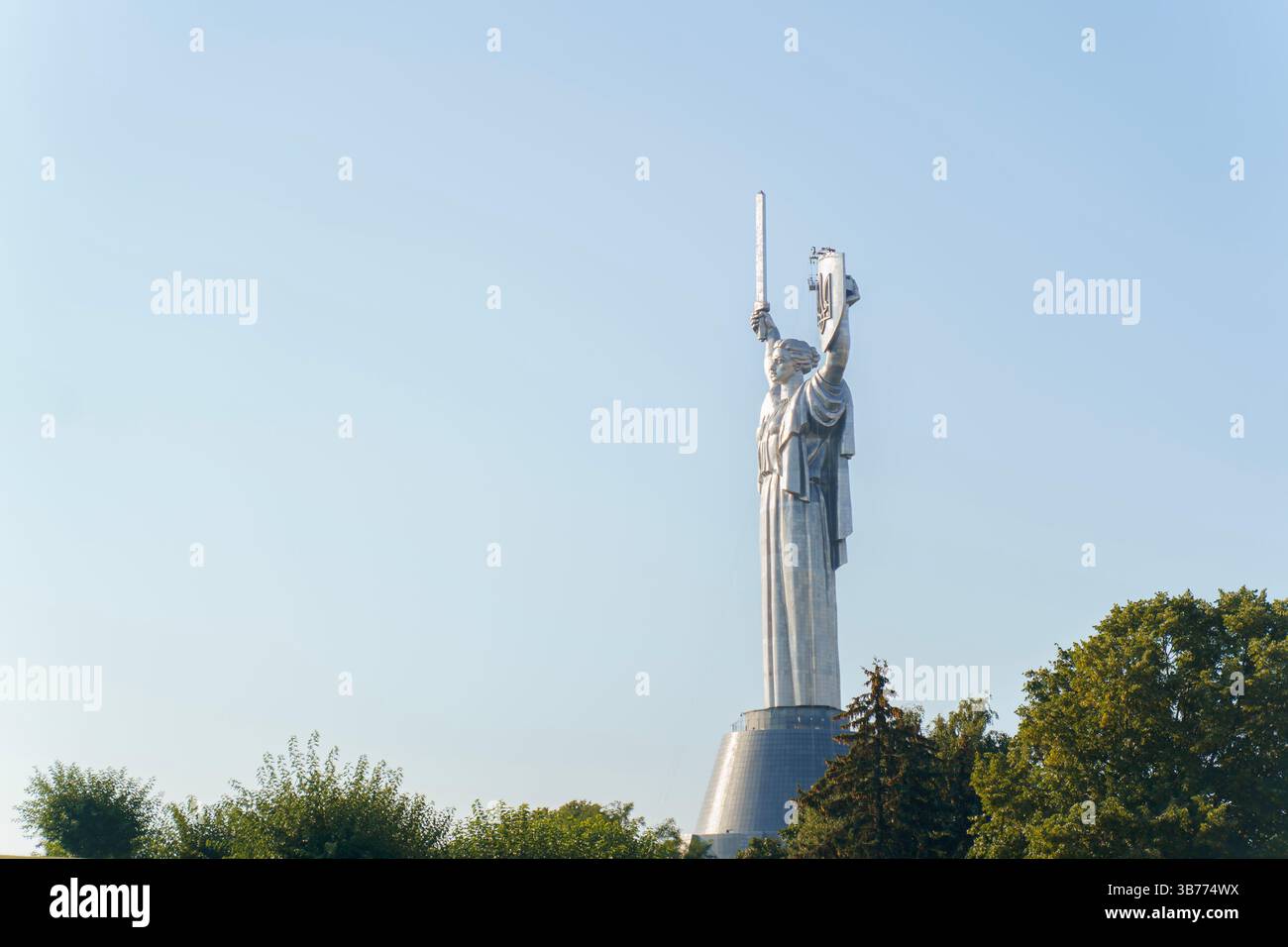 The statue of the Motherland Monument holding a sword aloft and metal ...