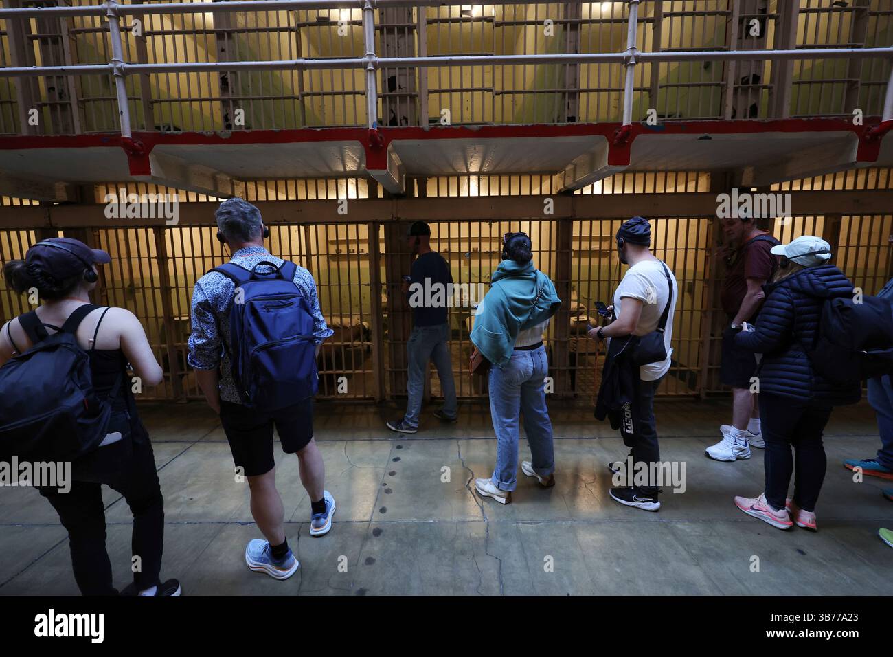 Visitors tour the prison cells on Alcatraz Island Monday, May 5, 2025 ...
