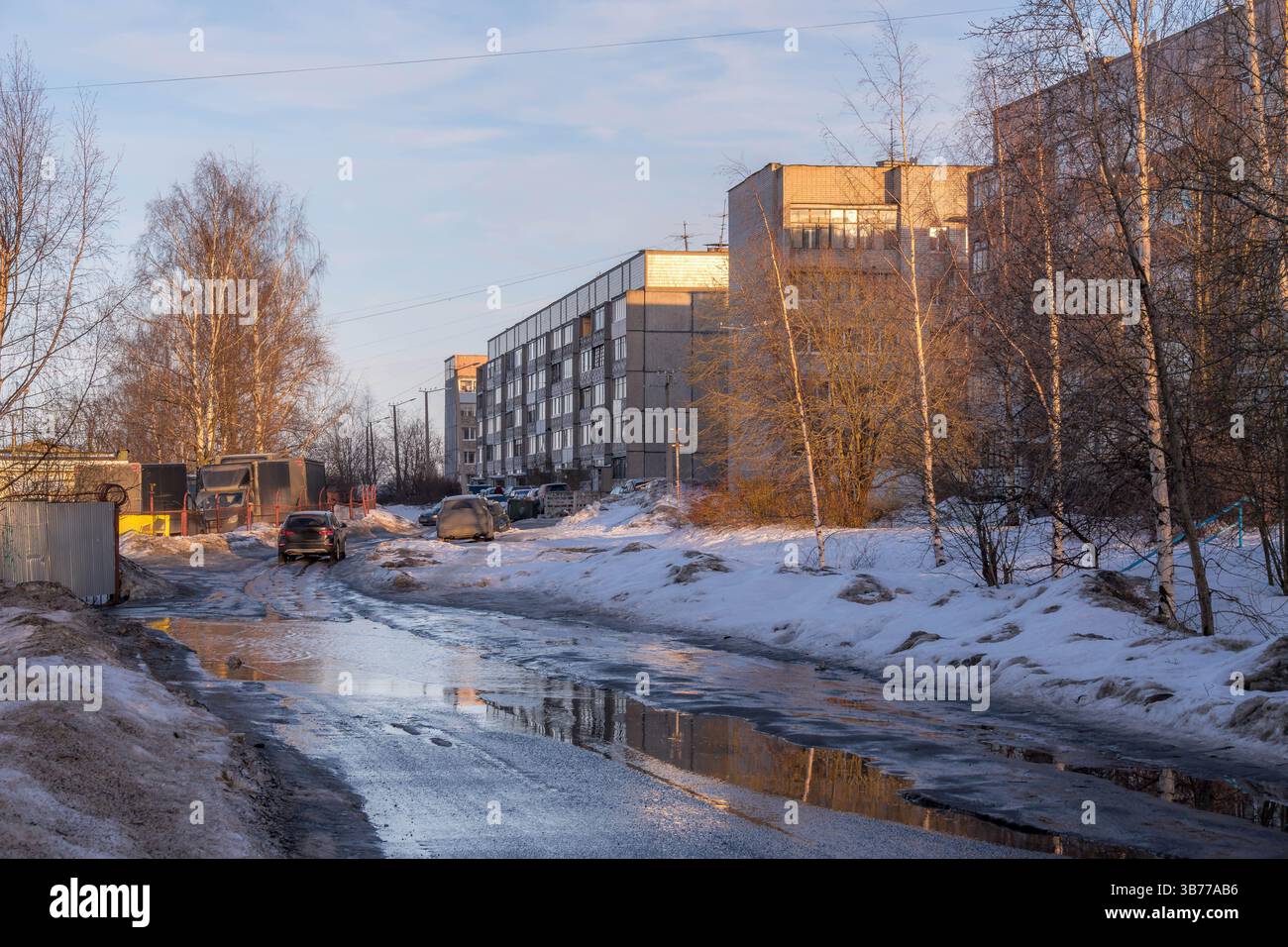 A quiet, older residential street in Petrozavodsk, reflecting Soviet ...