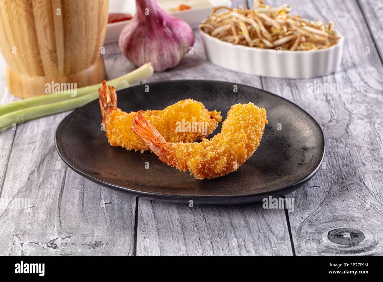 Golden crunhy breaded prawn appetizer snack Stock Photo - Alamy