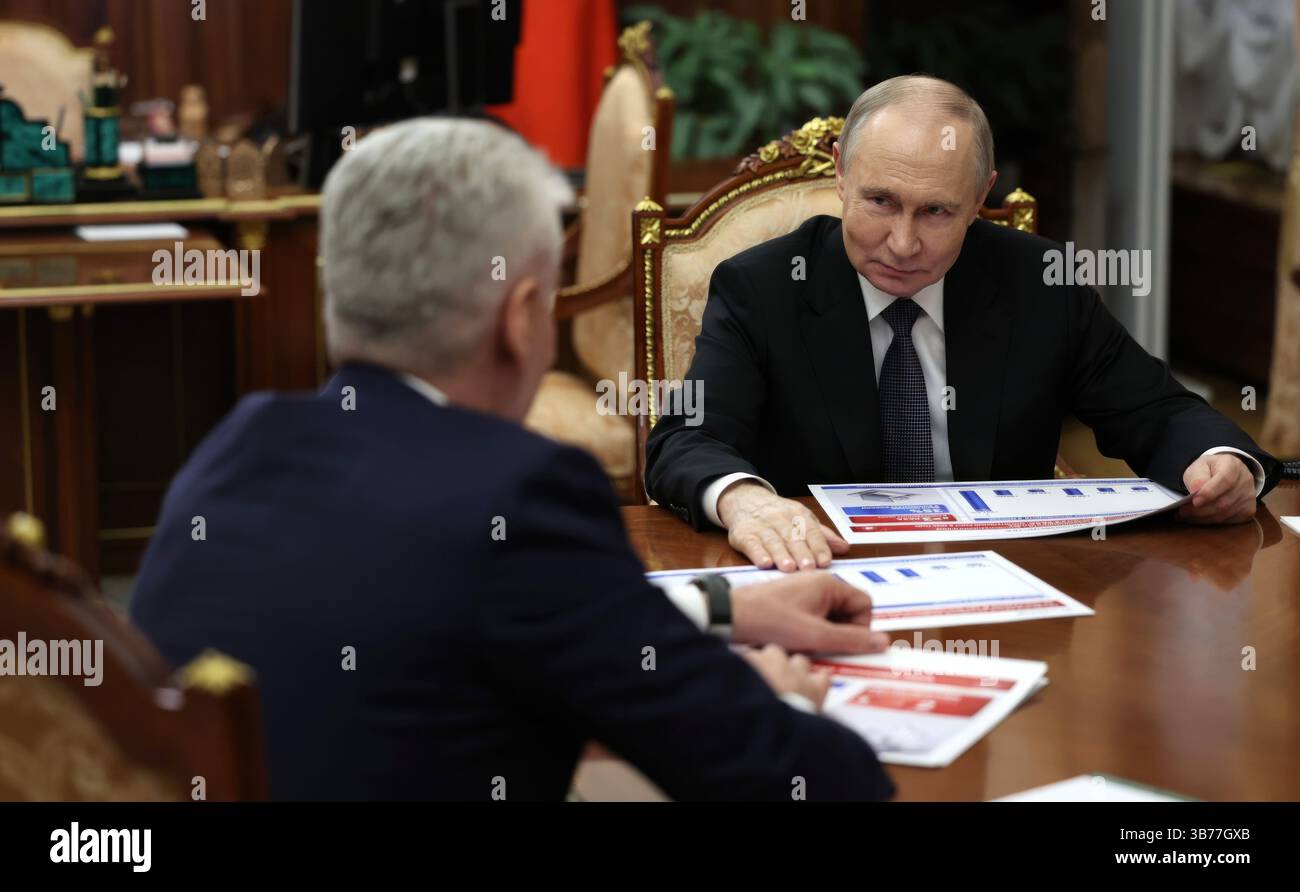 Moscow, Russia. 05th May, 2025. Russian President Vladimir Putin, right ...
