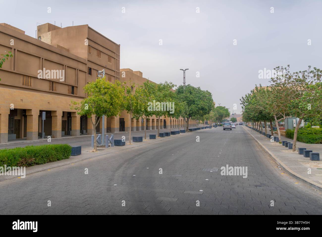 A quiet, historic street in Riyadh, Saudi Arabia, lined with ...