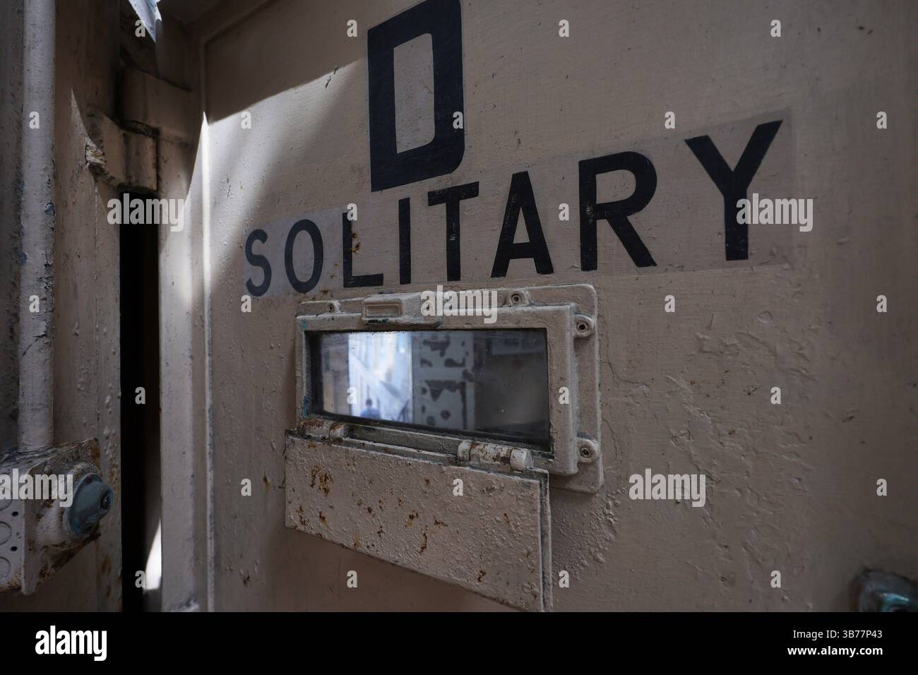 The door to a solitary confinement cell is shown on Alcatraz Island ...