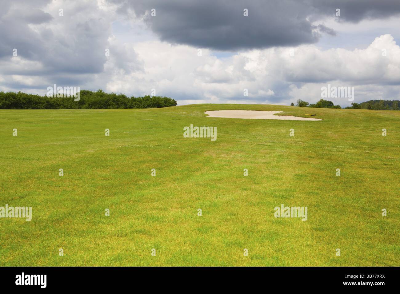 Sand golf bunker on a empty golf course before storm Stock Photo - Alamy