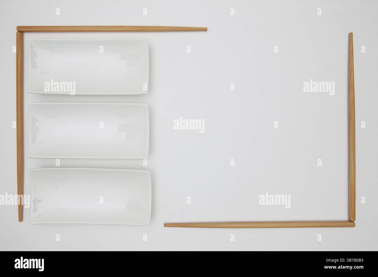 Top View Of White Empty Sushi Plates With Bamboo Chopsticks. Symmetry ...
