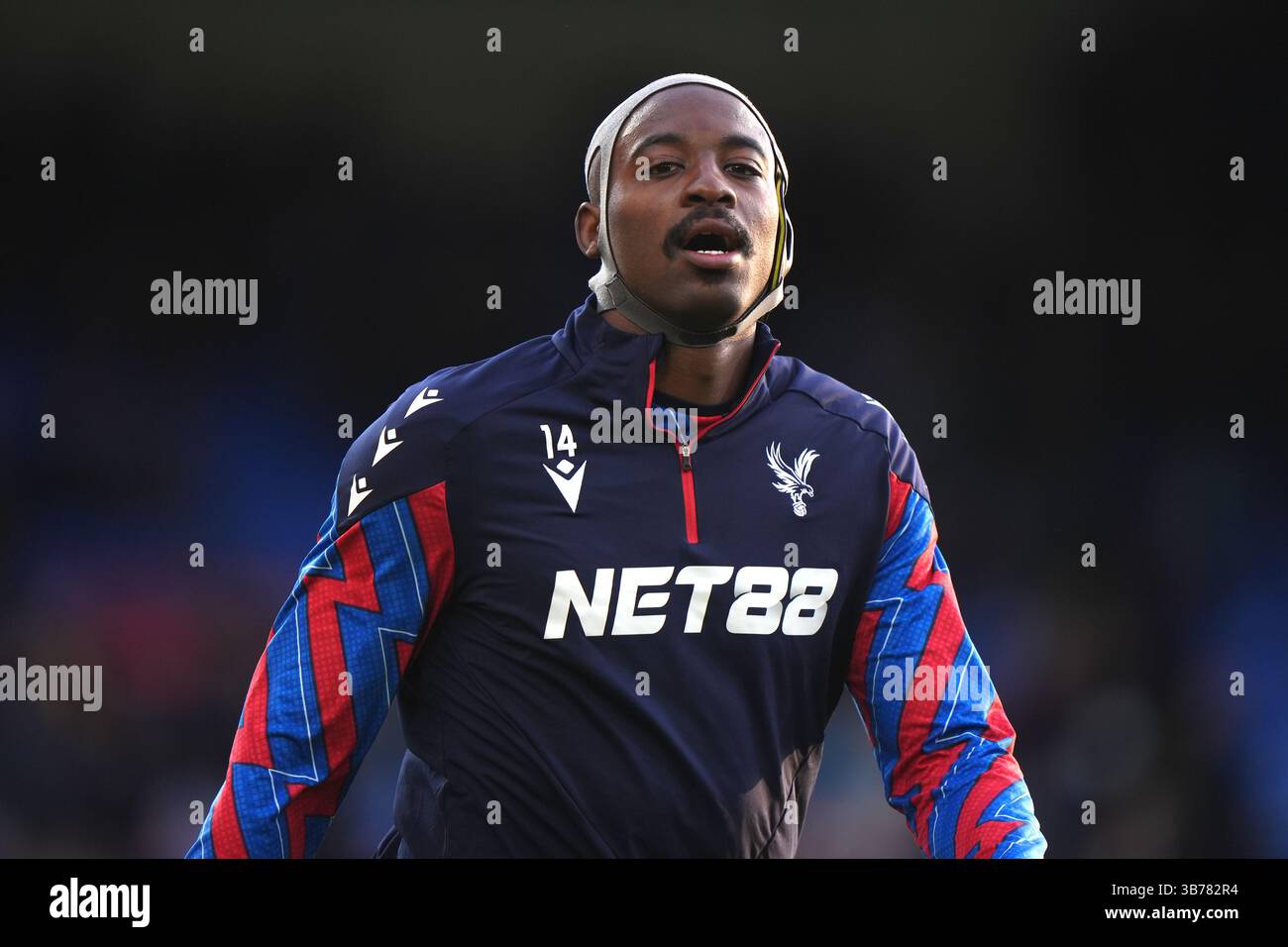 Crystal Palace's Jean-Philippe Mateta wearing a protective ear guard as ...