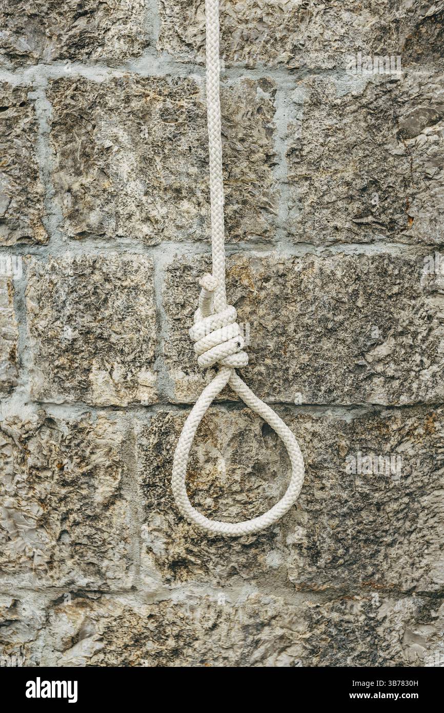 Loop for hanging from a light rope, on a stone background Stock Photo ...