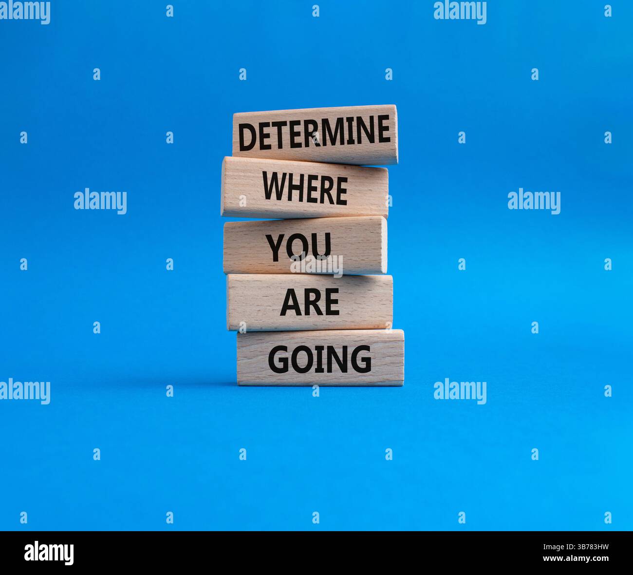 Determination symbol. Wooden blocks with words Determine where you are ...