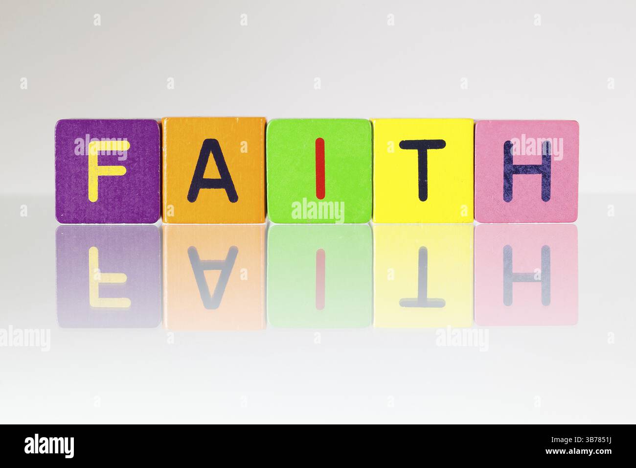 Faith - an inscription from children's wooden blocks Stock Photo - Alamy
