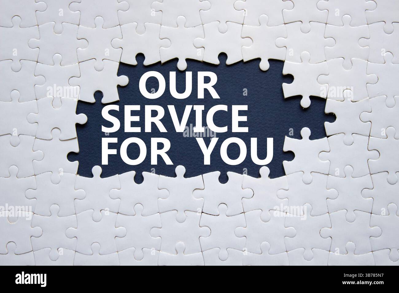 Our service for you symbol. White puzzle with words Our service for you ...