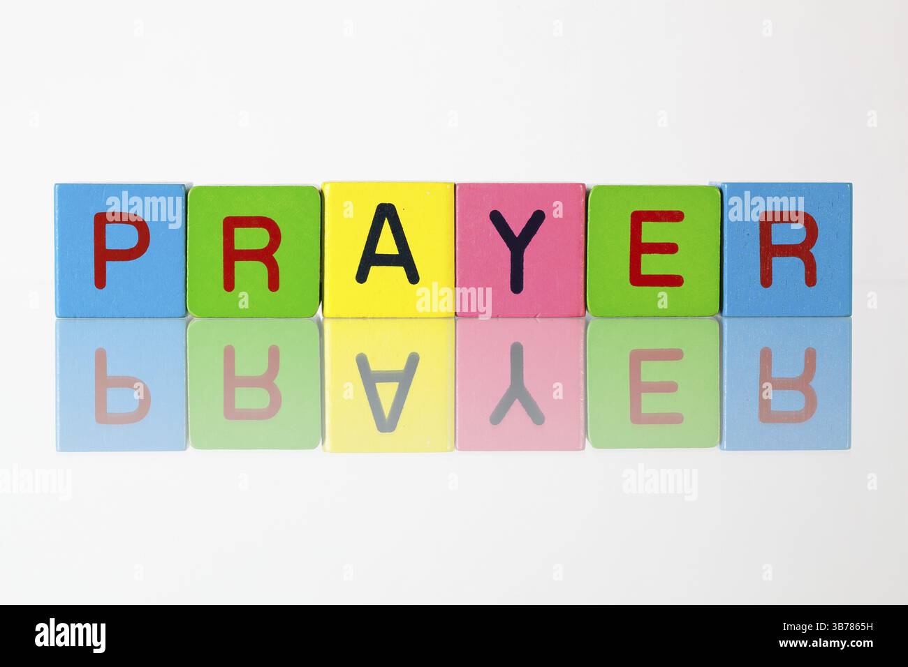 Prayer - an inscription from children's wooden blocks Stock Photo - Alamy