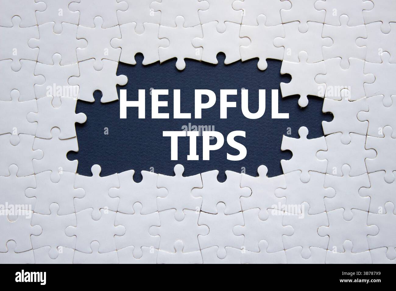 Helpful tips symbol. White puzzle with words Helpful tips. Beautiful ...