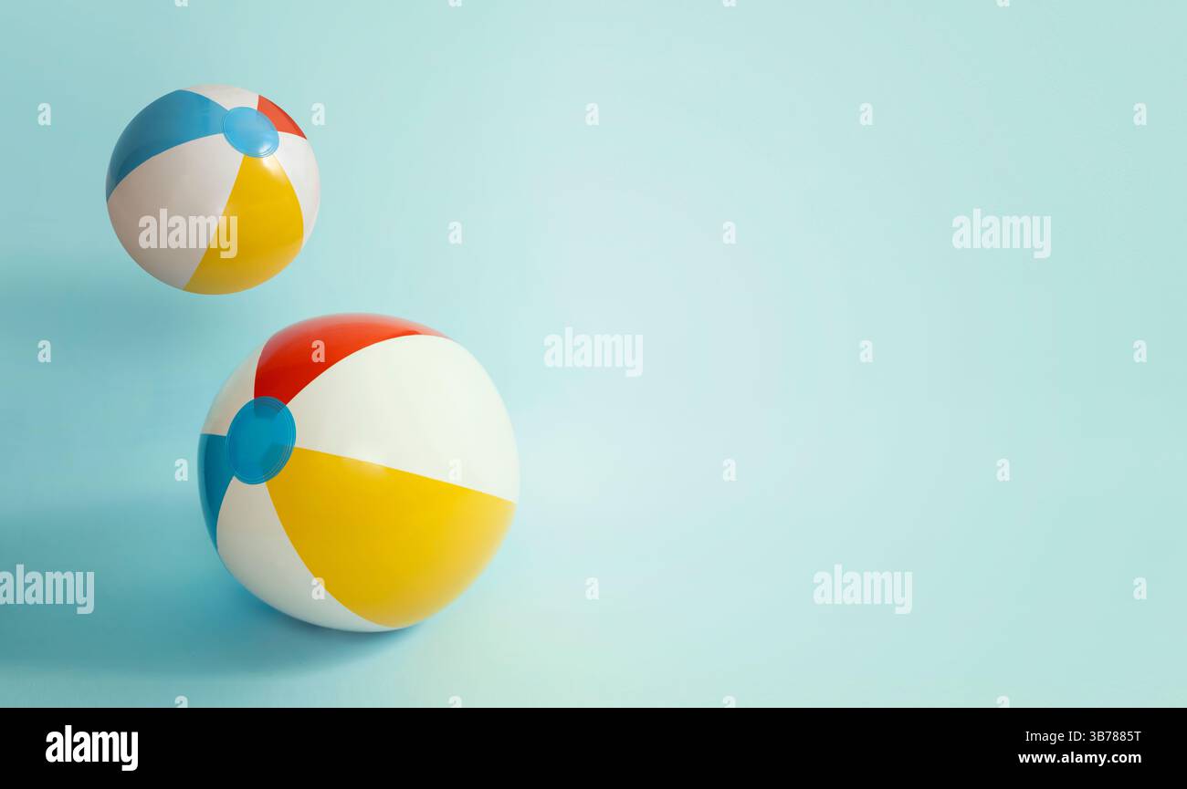 Beach balls, on blue empty space background, summer items, holiday ...