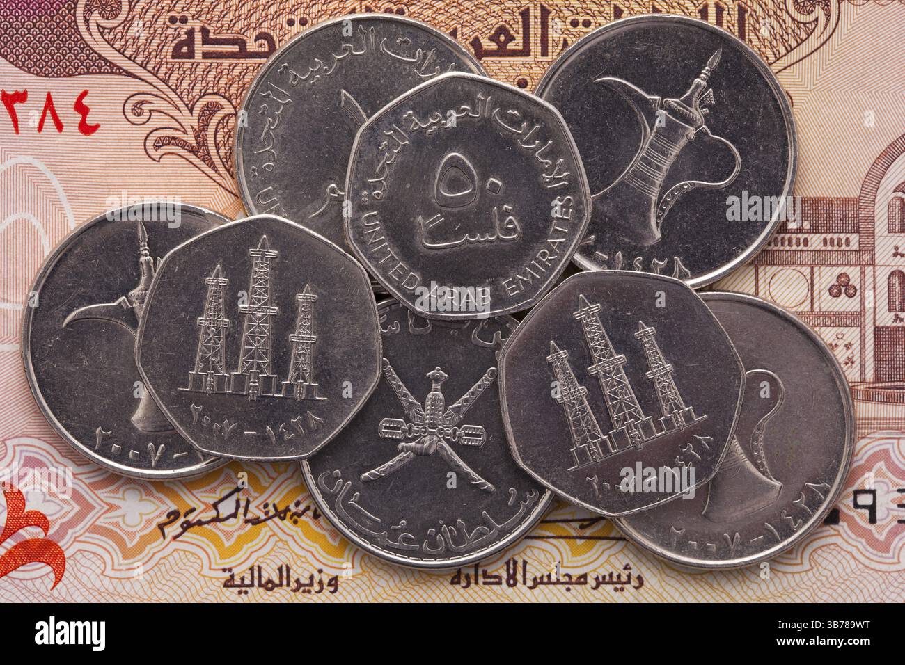 Different banknotes and coins of Arab Emirates Dirham Stock Photo - Alamy