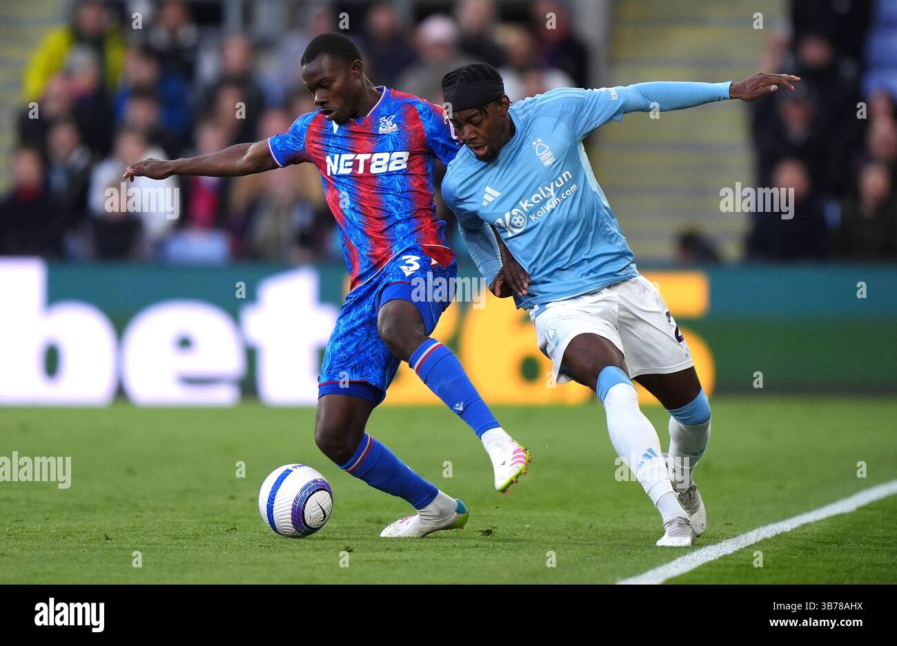 Crystal Palace's Tyrick Mitchell (left) and Nottingham Forest's Anthony ...