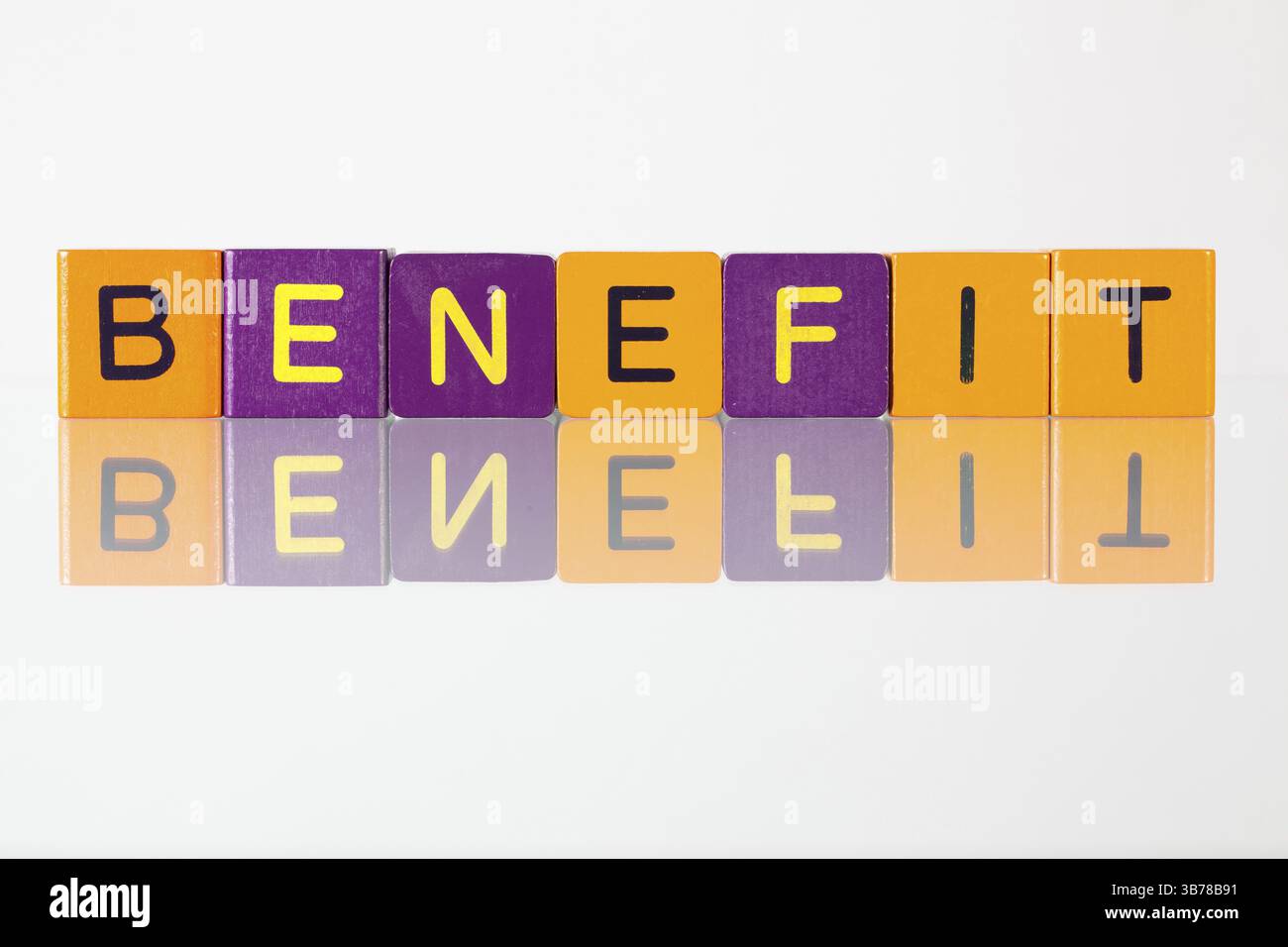 Benefit - an inscription from children's wooden blocks Stock Photo - Alamy
