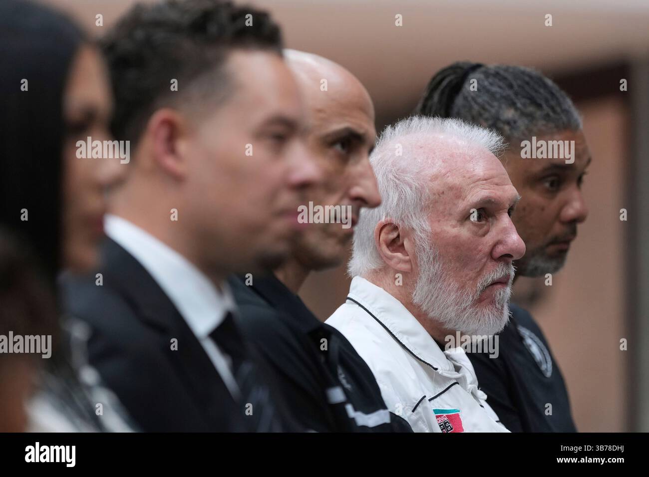 Former San Antonio Spurs head coach Gregg Popovich, second from right ...