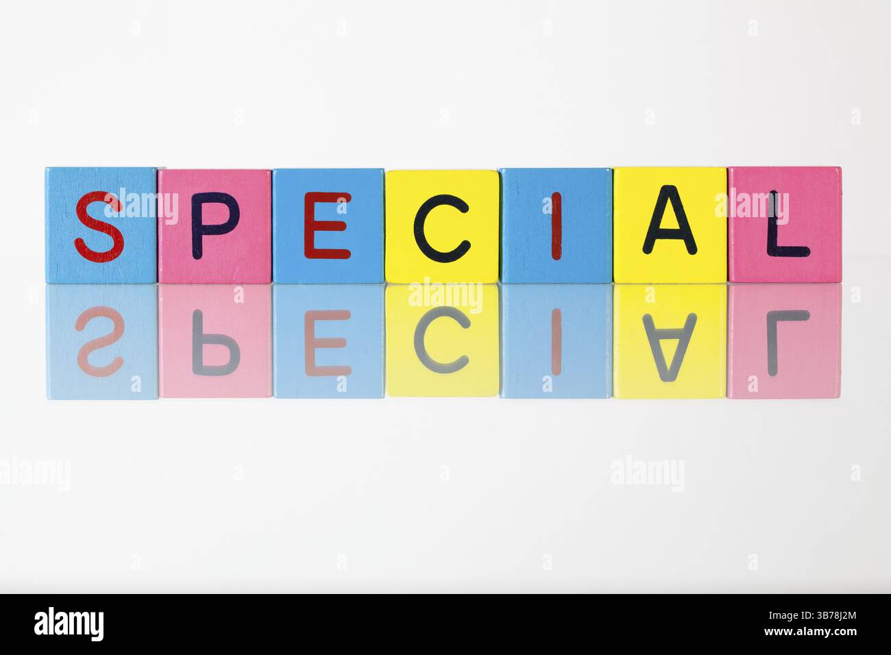 Special - an inscription from children's wooden blocks Stock Photo - Alamy