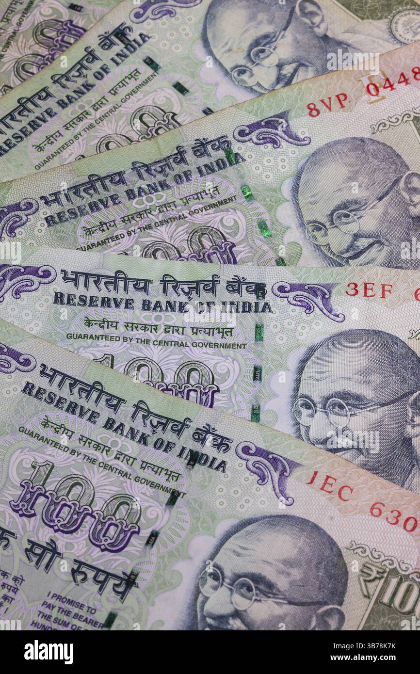Different banknotes from India on the desk Stock Photo - Alamy