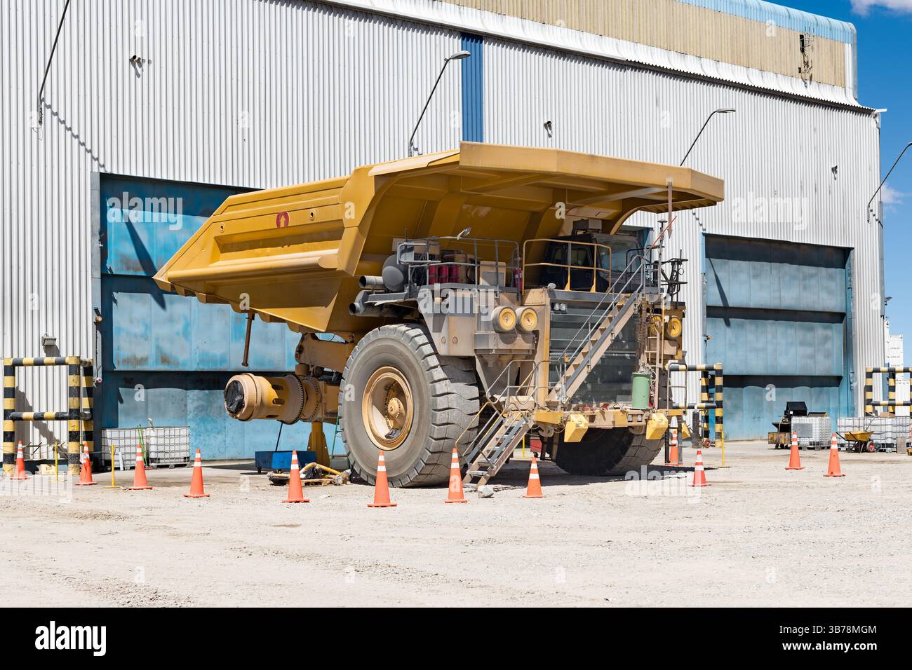 Huge mining truck in the maintenance workshop at a mining operation ...