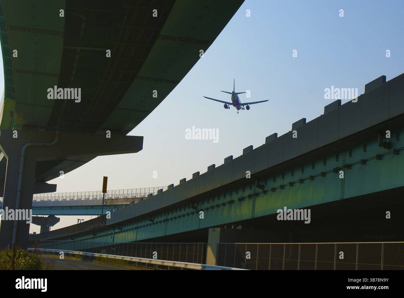 Plane visible from the interval of the high-speed road. Shooting ...