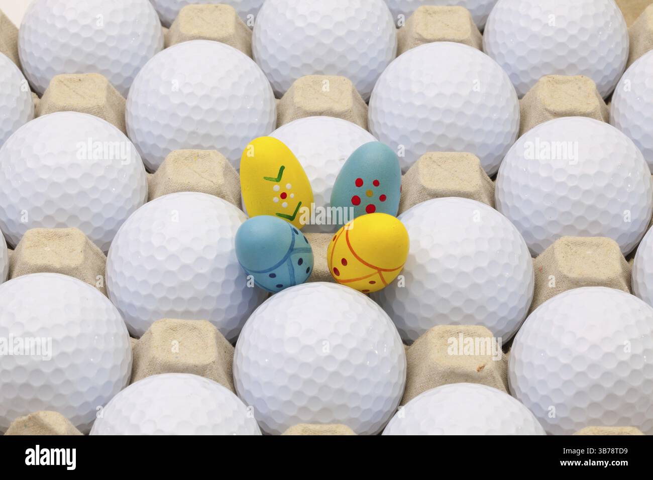 White golf balls in the box for eggs and Easter decoration Stock Photo ...