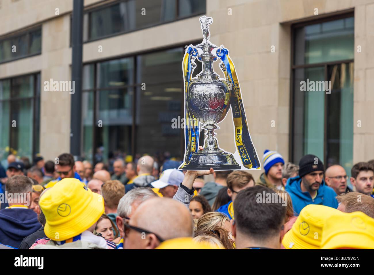Leeds, UK. 05 MAY, 2025. Person holds a cut out of the EFL trophy as ...
