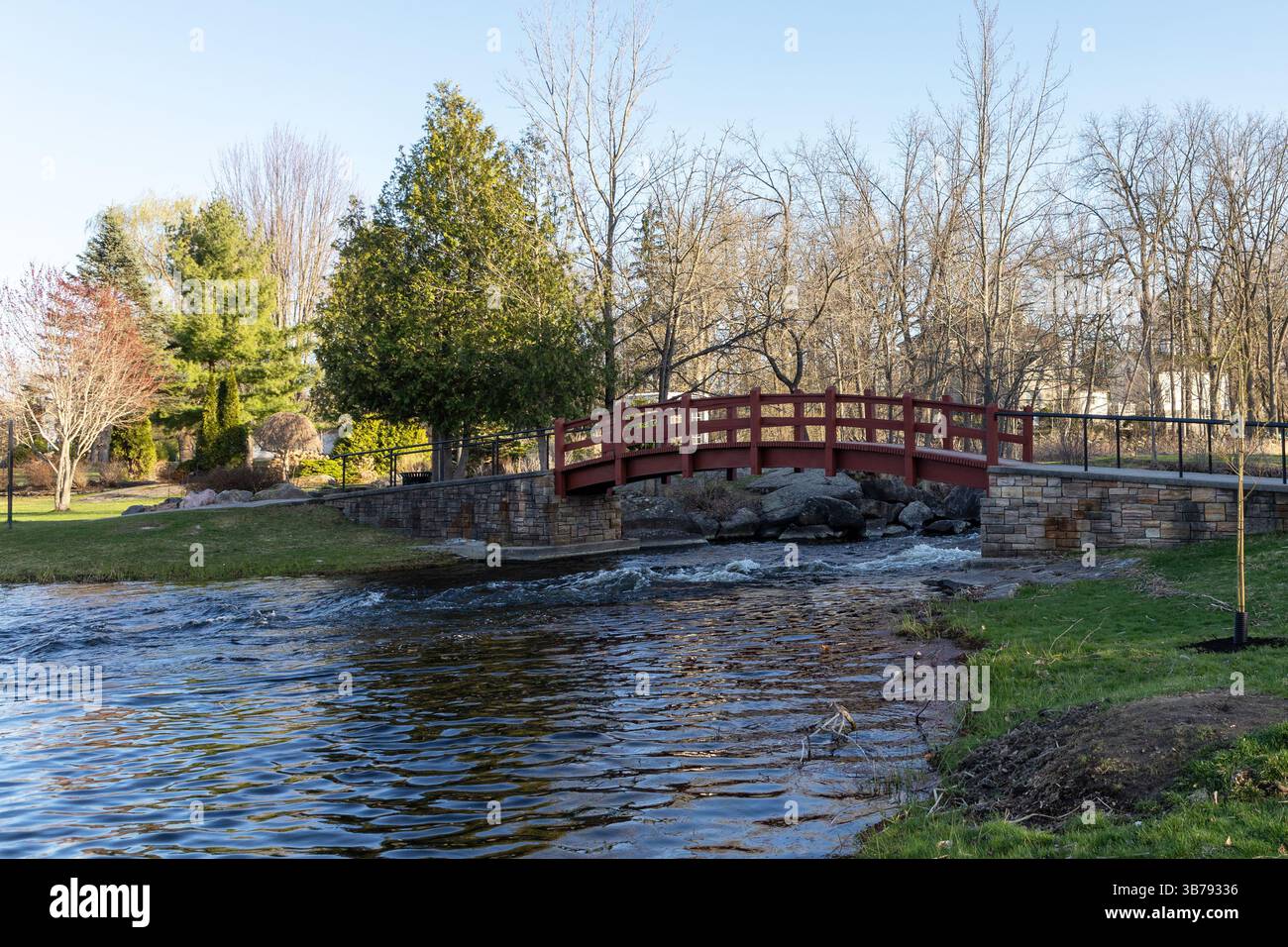 Park with bridge over a stream in spring. Stewart Park In Perth ...