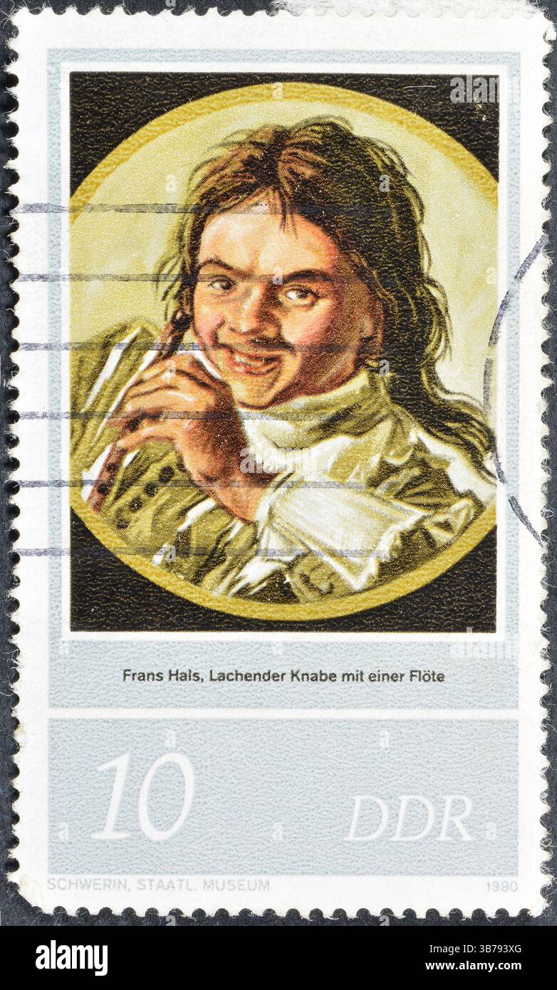 Cancelled postage stamp printed by DDR, that shows painting "Laughing ...