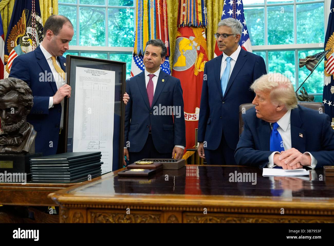 President Donald Trump listens to White House staff secretary Will ...
