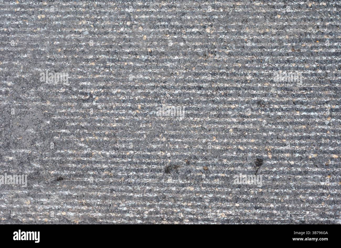 Scraped asphalt layer during road works at Avenue Firmin Lecharlier ...
