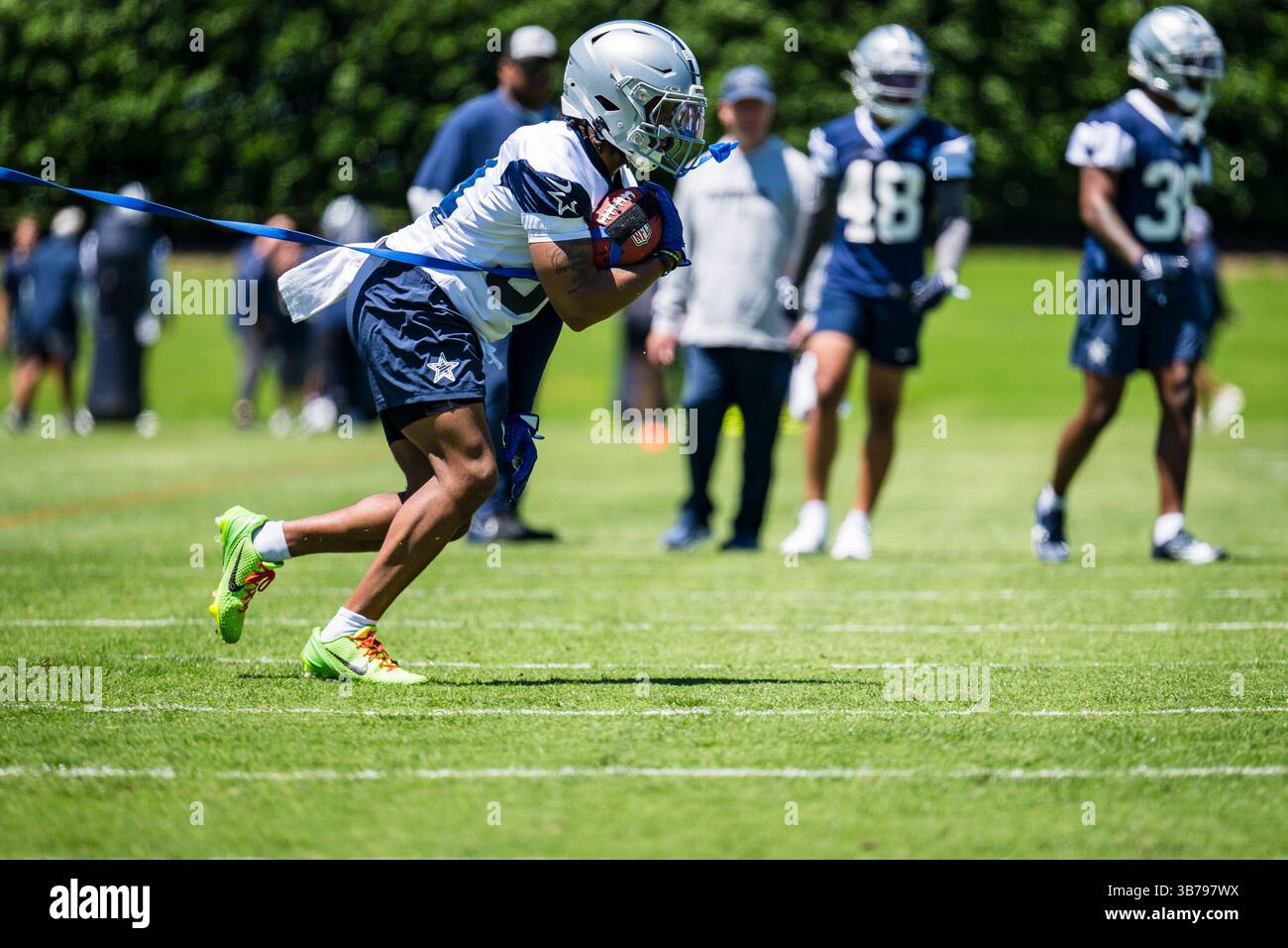 Dallas Cowboys' Jaydon Blue runs a drill during an NFL football team's rookie camp, Saturday ...
