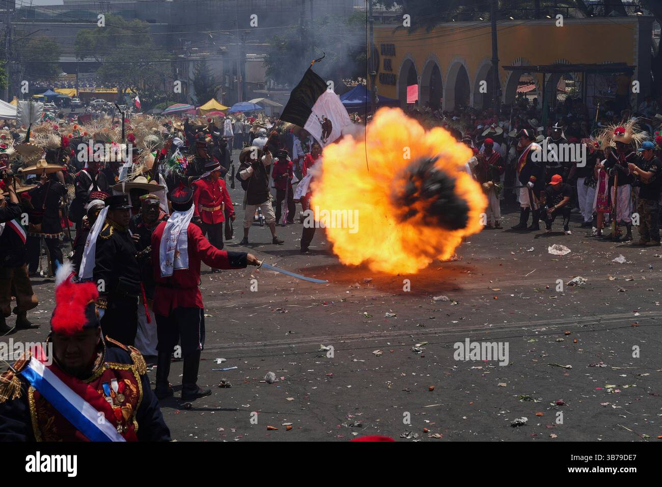 People participate in a reenactment of the Battle of Puebla during a ...