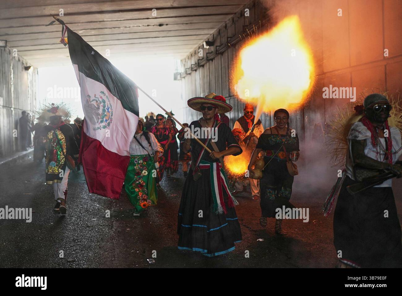 People participate in a reenactment of the Battle of Puebla during a ...
