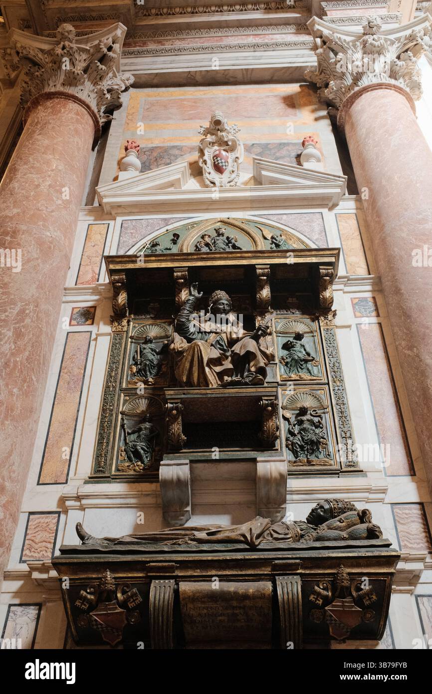 Ornate baroque tomb monuments inside Saint Peters Basilica featuring ...