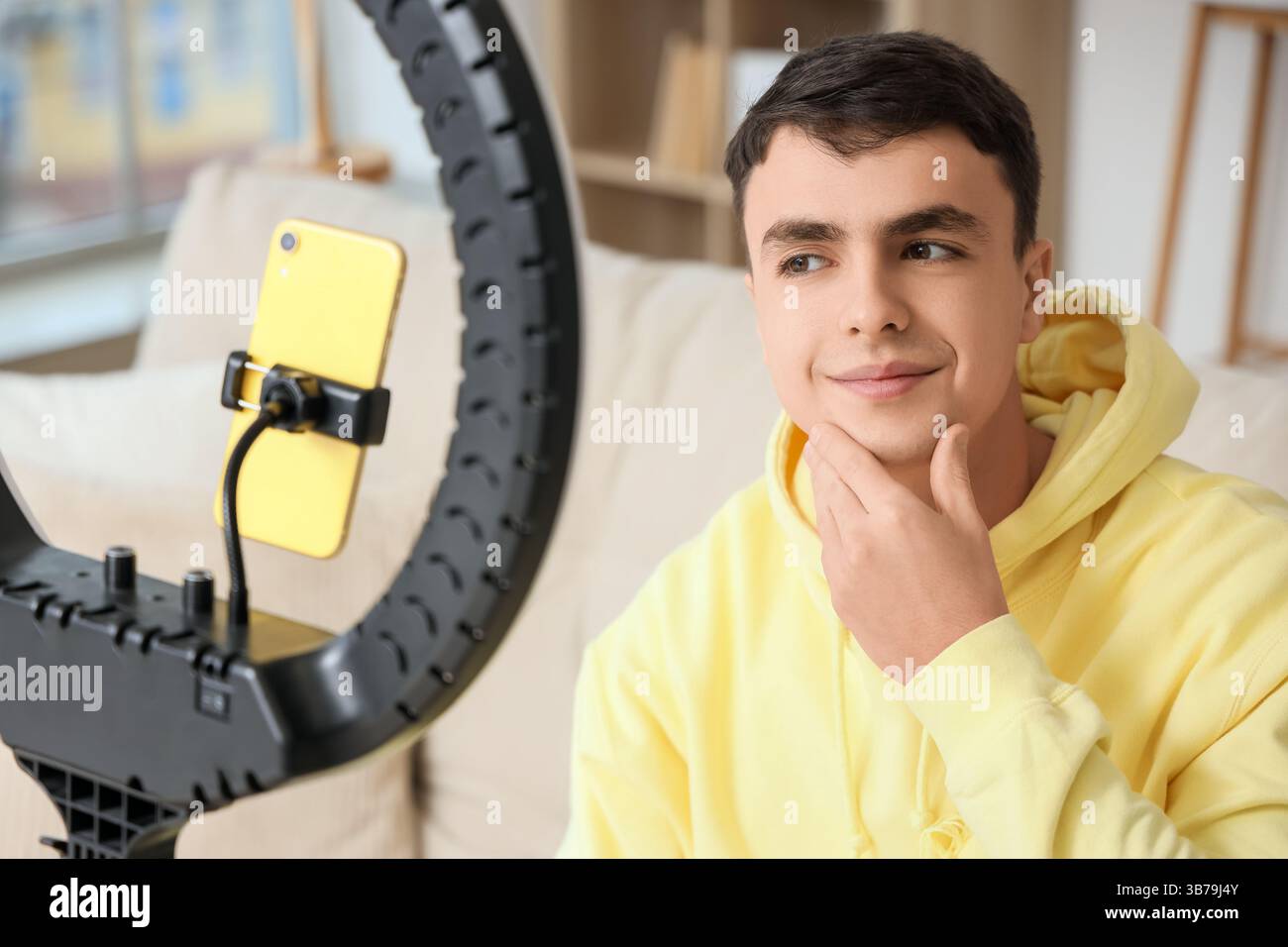 Male beauty blogger doing hi-res stock photography and images - Alamy