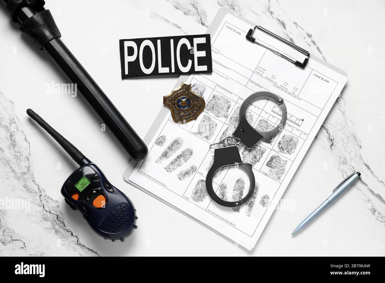 Handcuffs, fingerprints sheets, baton, walkie-talkie and police shield ...