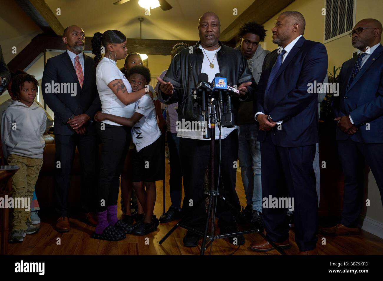 Ryan Hinton's grandfater, Rodney Hinton Sr., center, speaks during a ...