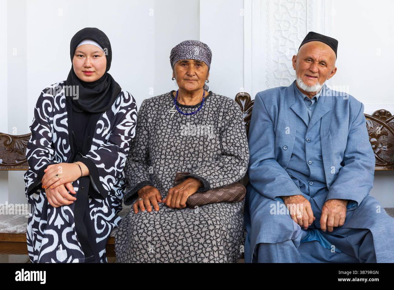 An Uzbek family in traditional attire at Shah-I-Zinda in Samarkand ...